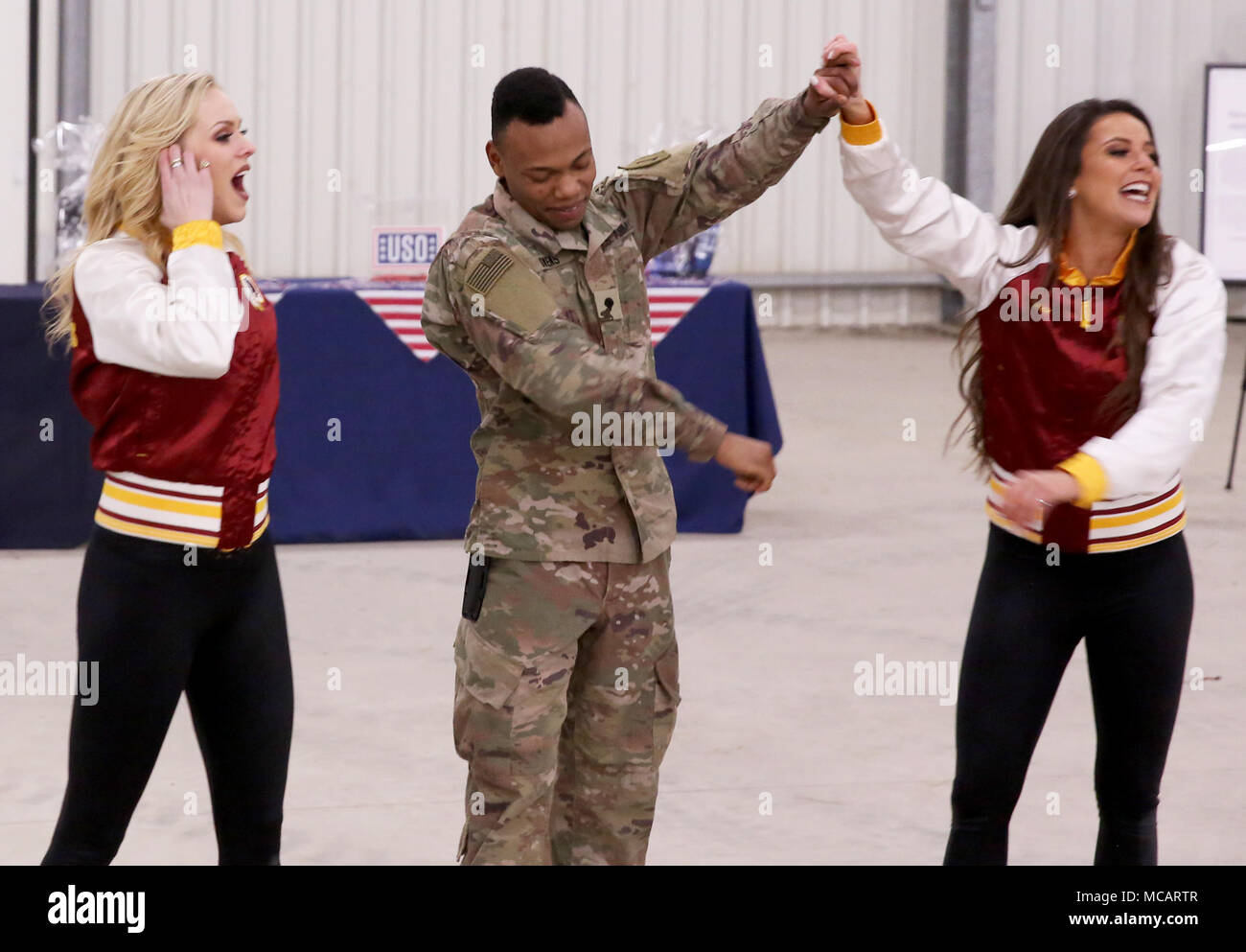 A U.S. Army Soldier wins first place in the dance off during a visit ...