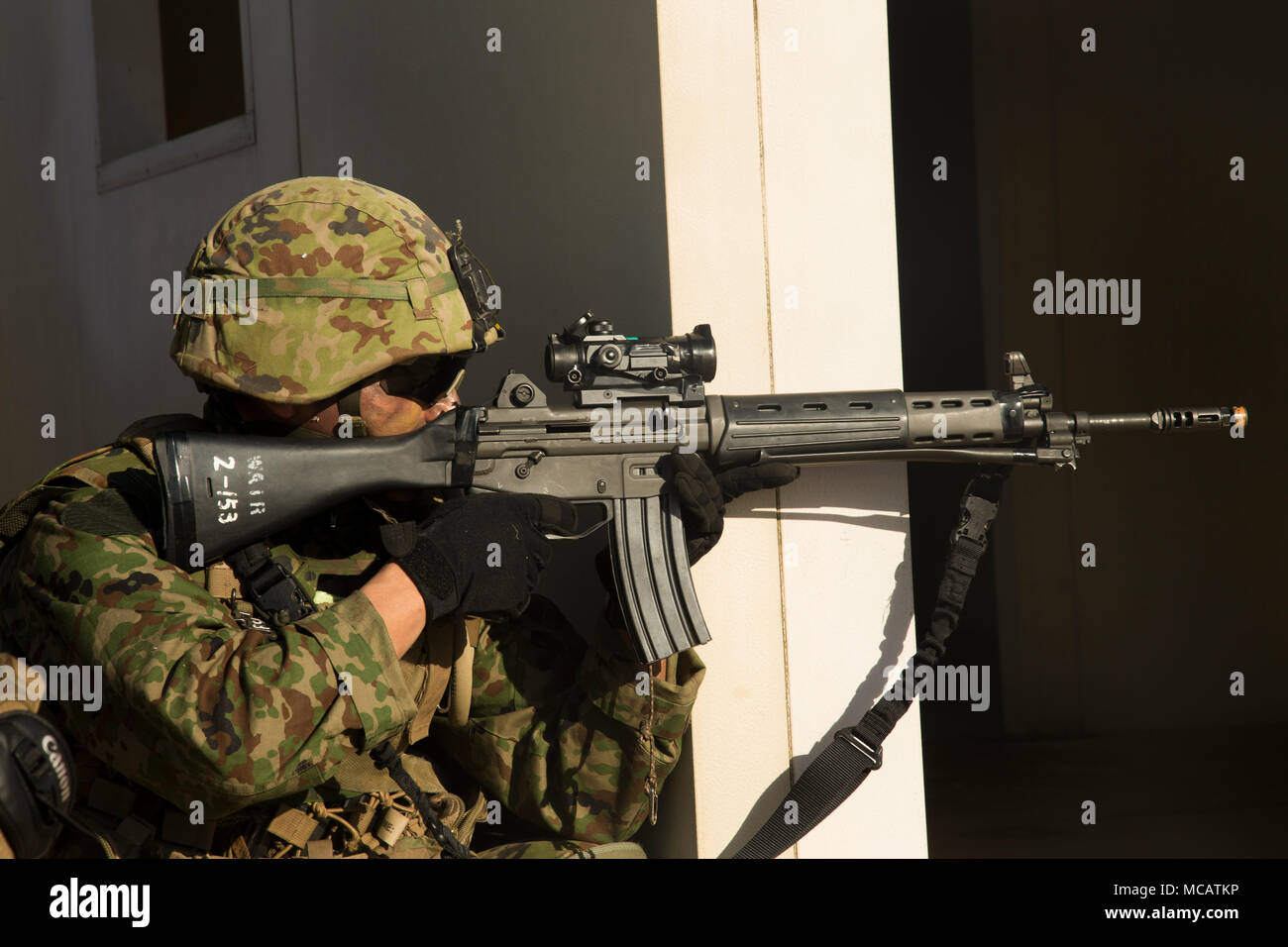 A Japanese Solder with Western Army Infantry, sights in during a ...