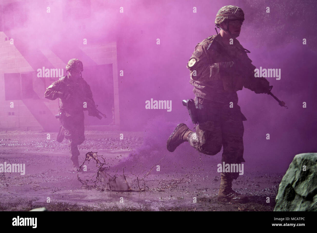 Airmen assigned to the 820th Base Defense Group advance their position ...