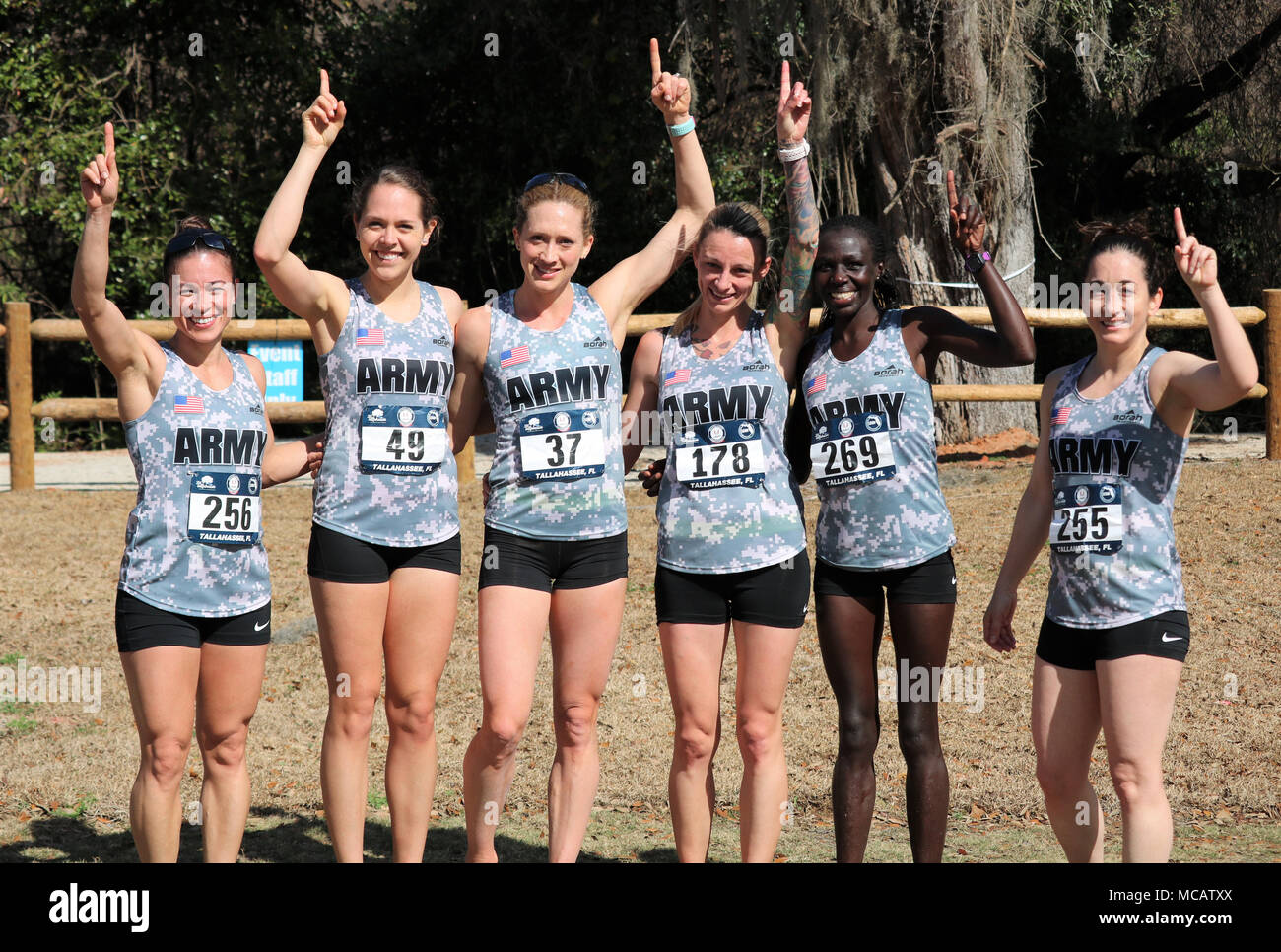 From left to right, Army cross country teammates Sgt. Esther Spradling ...