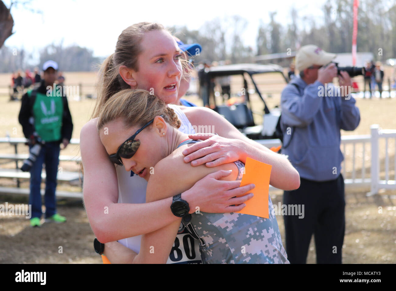 Air Force 2nd lt. Hannah Everson of Hurlburt Field, Florida and Army Maj. Kelly Calway of West ...