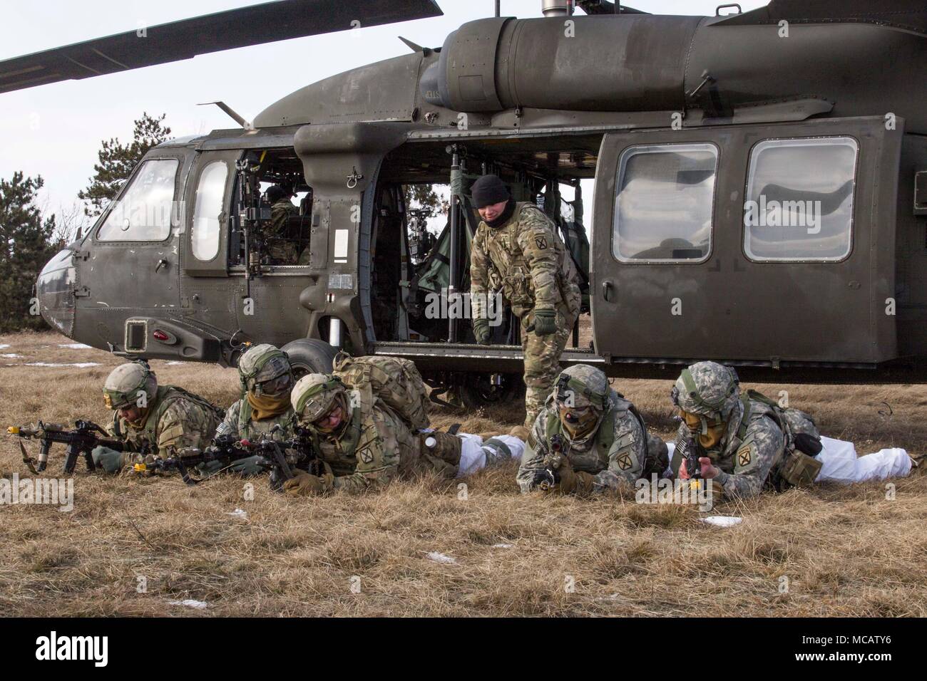 Spc. Marciel Cruz, a crew chief with C Company, 2-10 Assault Helicopter ...