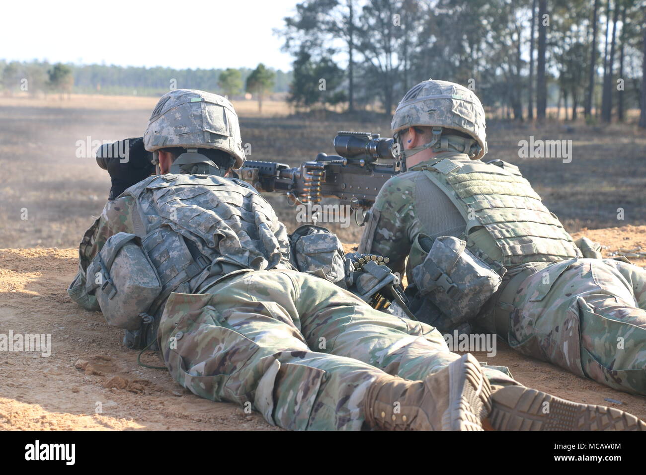 Spc. Ian Brown and Pfc. Howard Fritch, a machine gun crew assigned to A ...