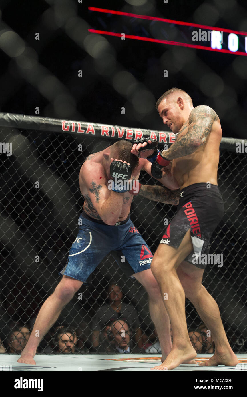 Phoenix, Arizona, USA. 14th Apr, 2018. DUSTIN POIRIER, right, throws a ...