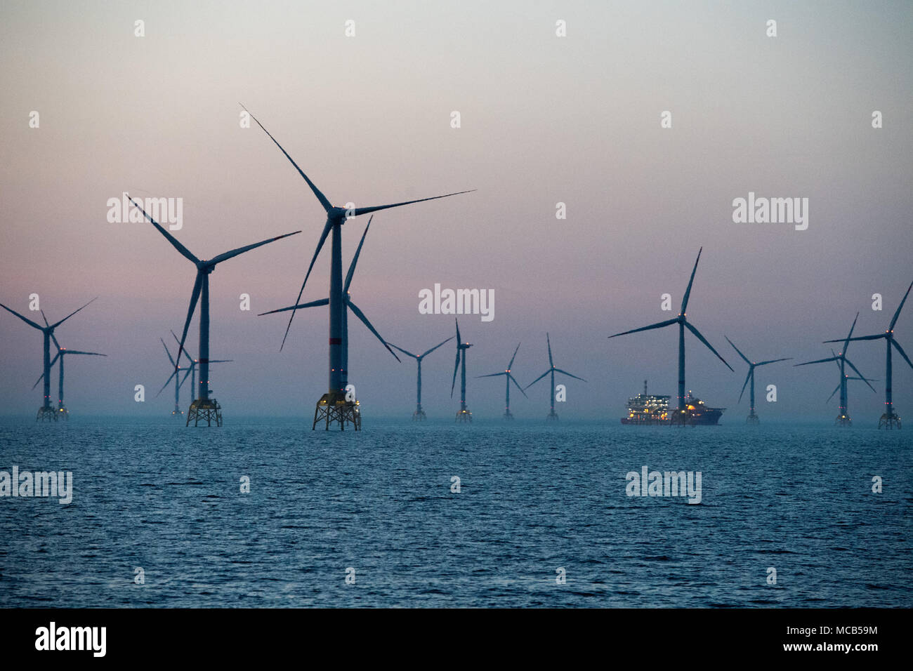 08 April 2018, Germany, Sassnitz: Offshore wind mills at the Baltic Sea ...