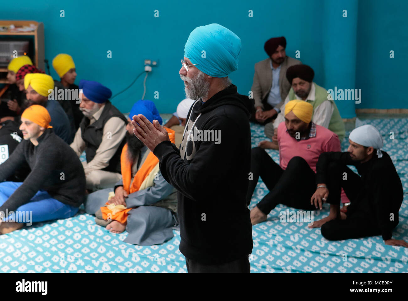 Palma de Mallorca, Spain. April 15, 2018. A man pray inside a Sikh ...