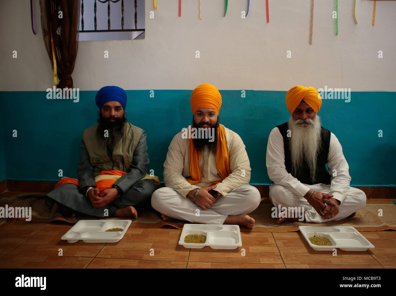 Palma de Mallorca, Spain. April 15, 2018. Sikh monks lunch inside a ...