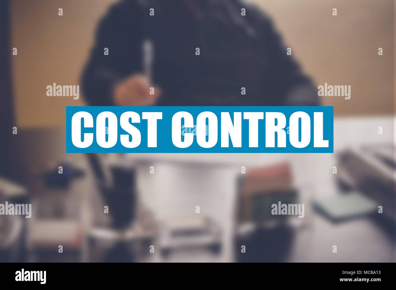 cost control word with business blurring background Stock Photo - Alamy