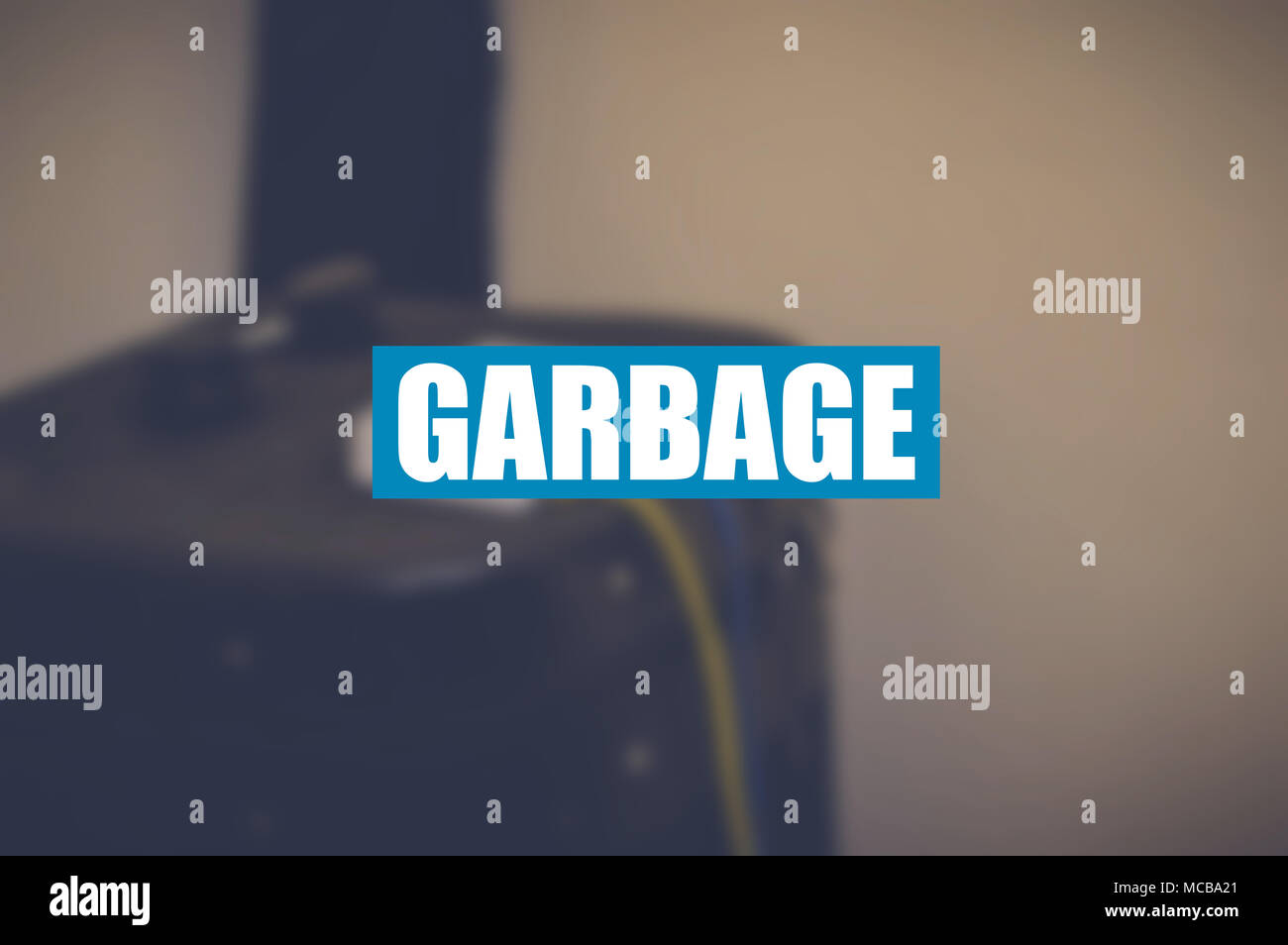 Garbage word with business blurring background Stock Photo - Alamy