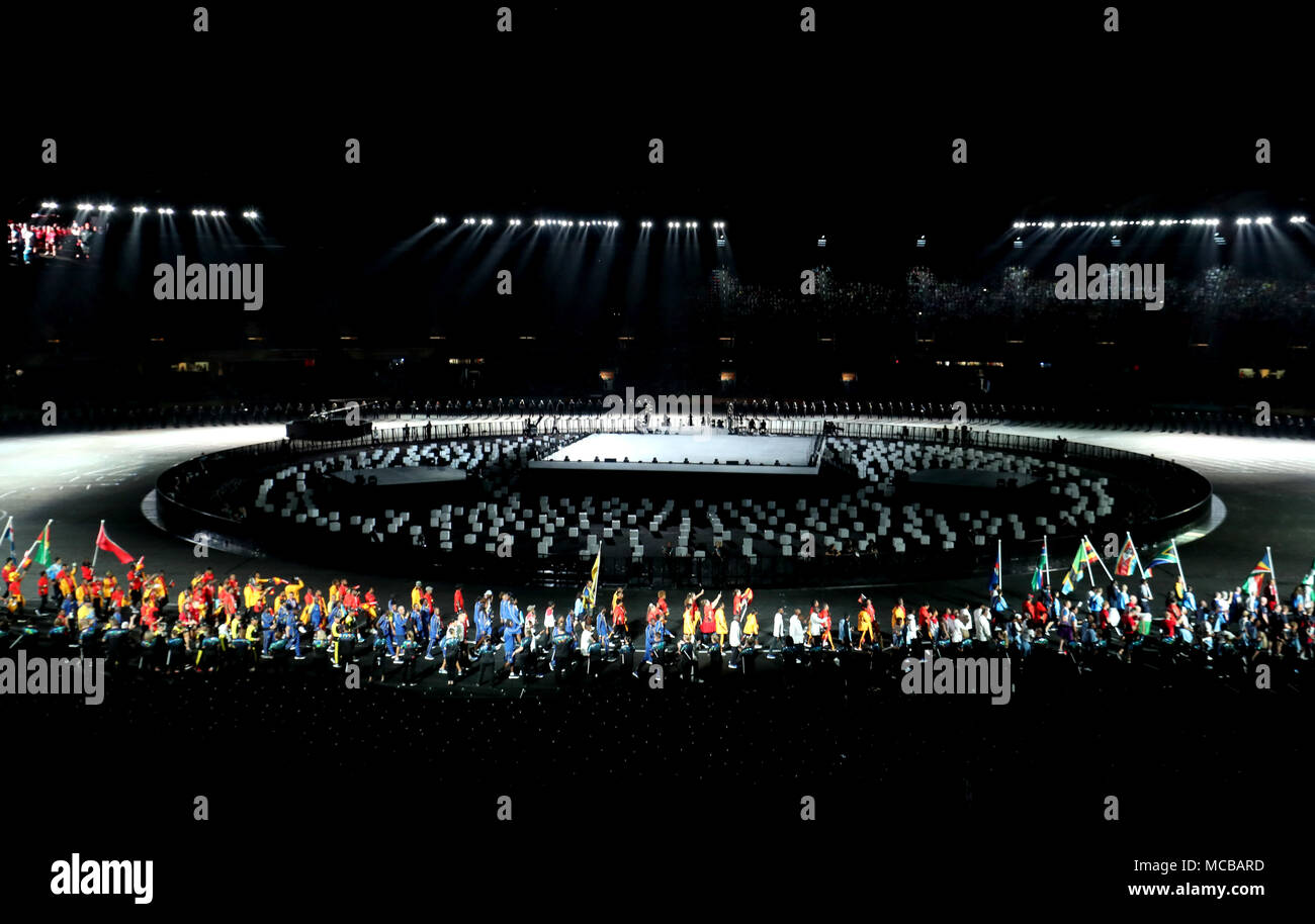 Athletes enter the stadium bearing flags during the Closing Ceremony ...