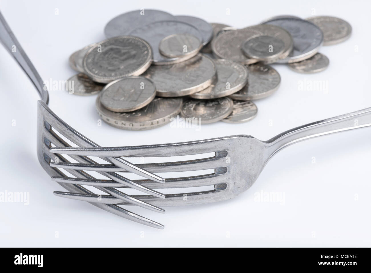 Greedy forks hi-res stock photography and images - Alamy