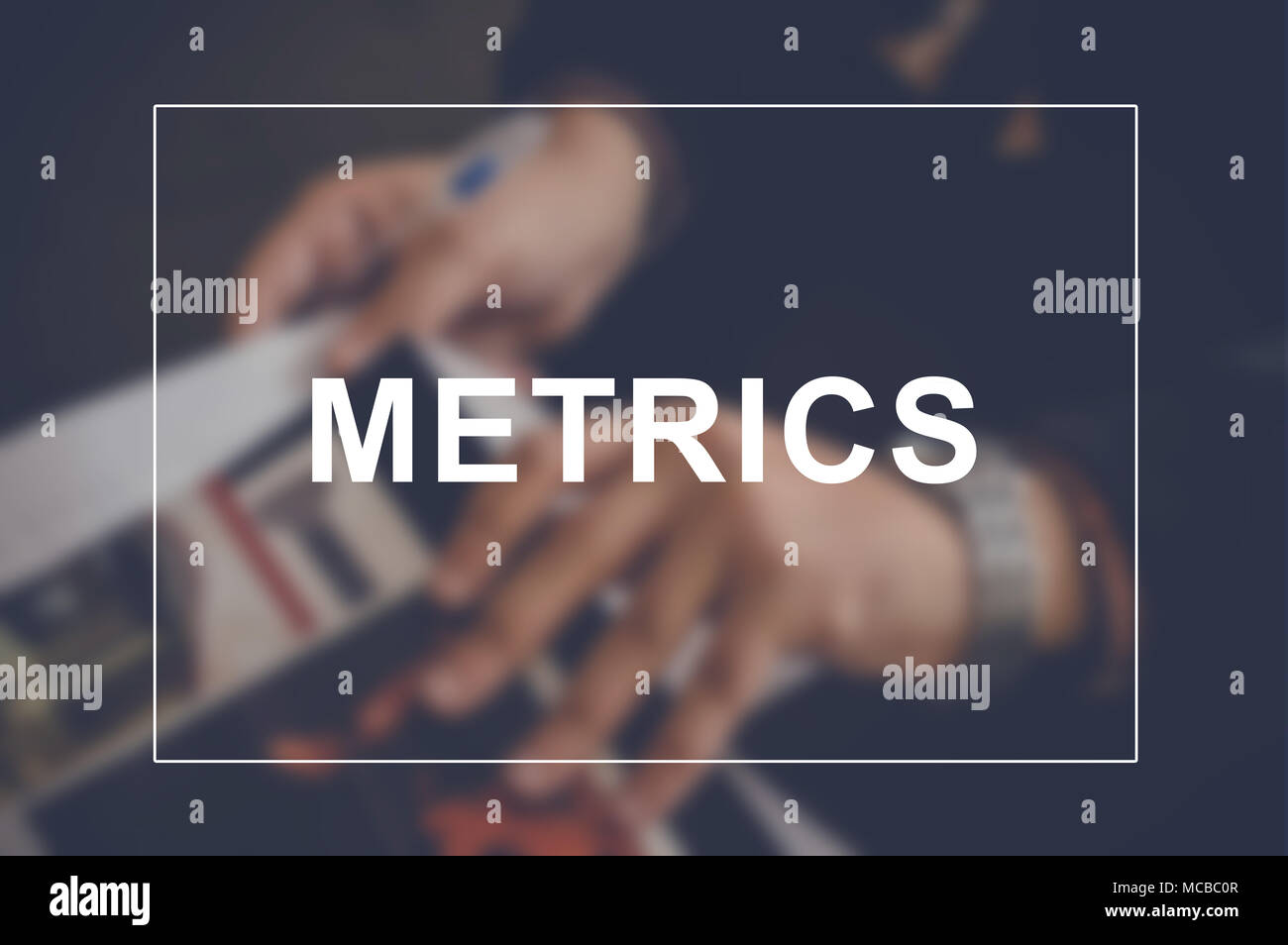 Metrics word with business blurring background Stock Photo - Alamy