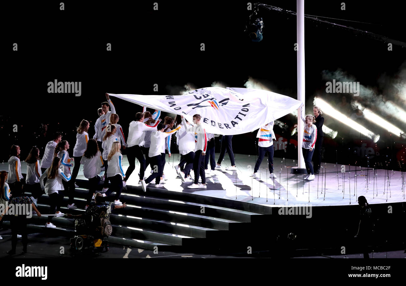 The Commonwealth Games Federation flag is carried on stage during the ...