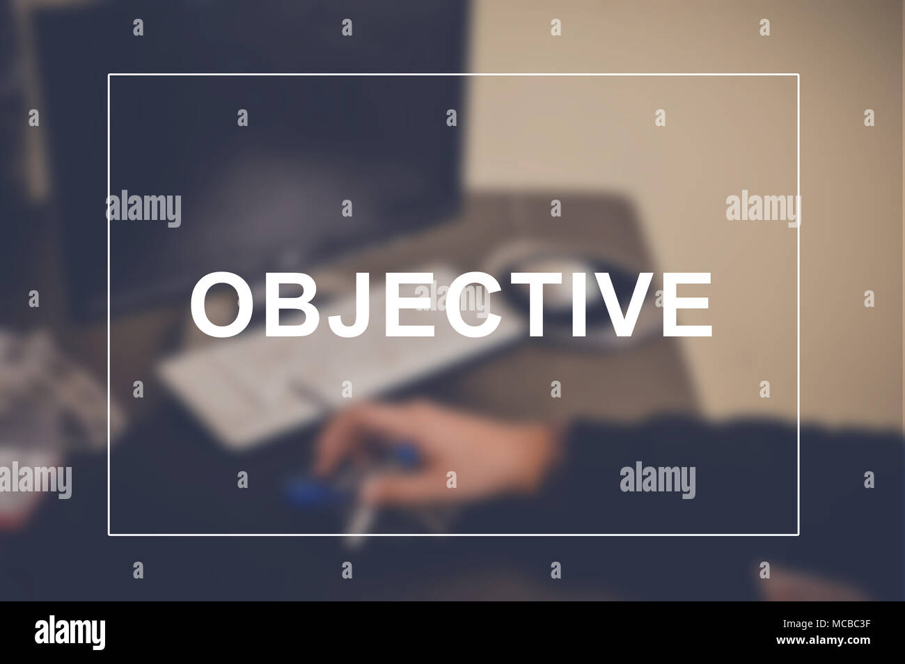 Objective word with business blurring background Stock Photo - Alamy