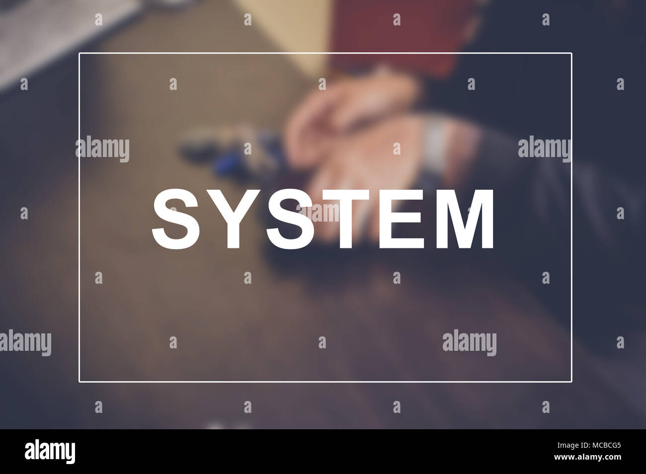 System word with business blurring background Stock Photo - Alamy