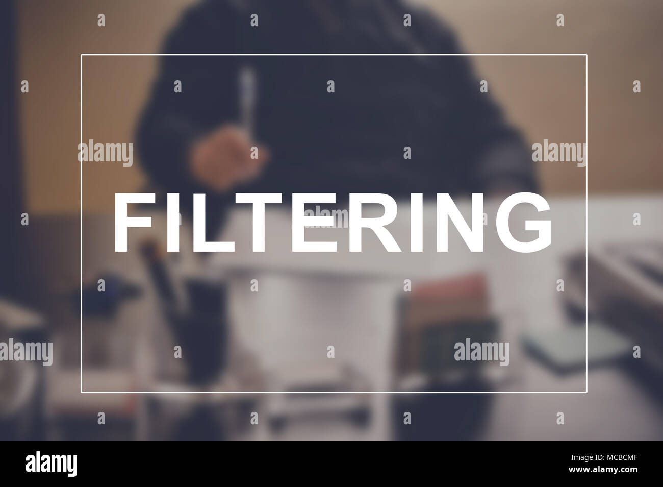 filtering word with blurring businessman at office background Stock ...