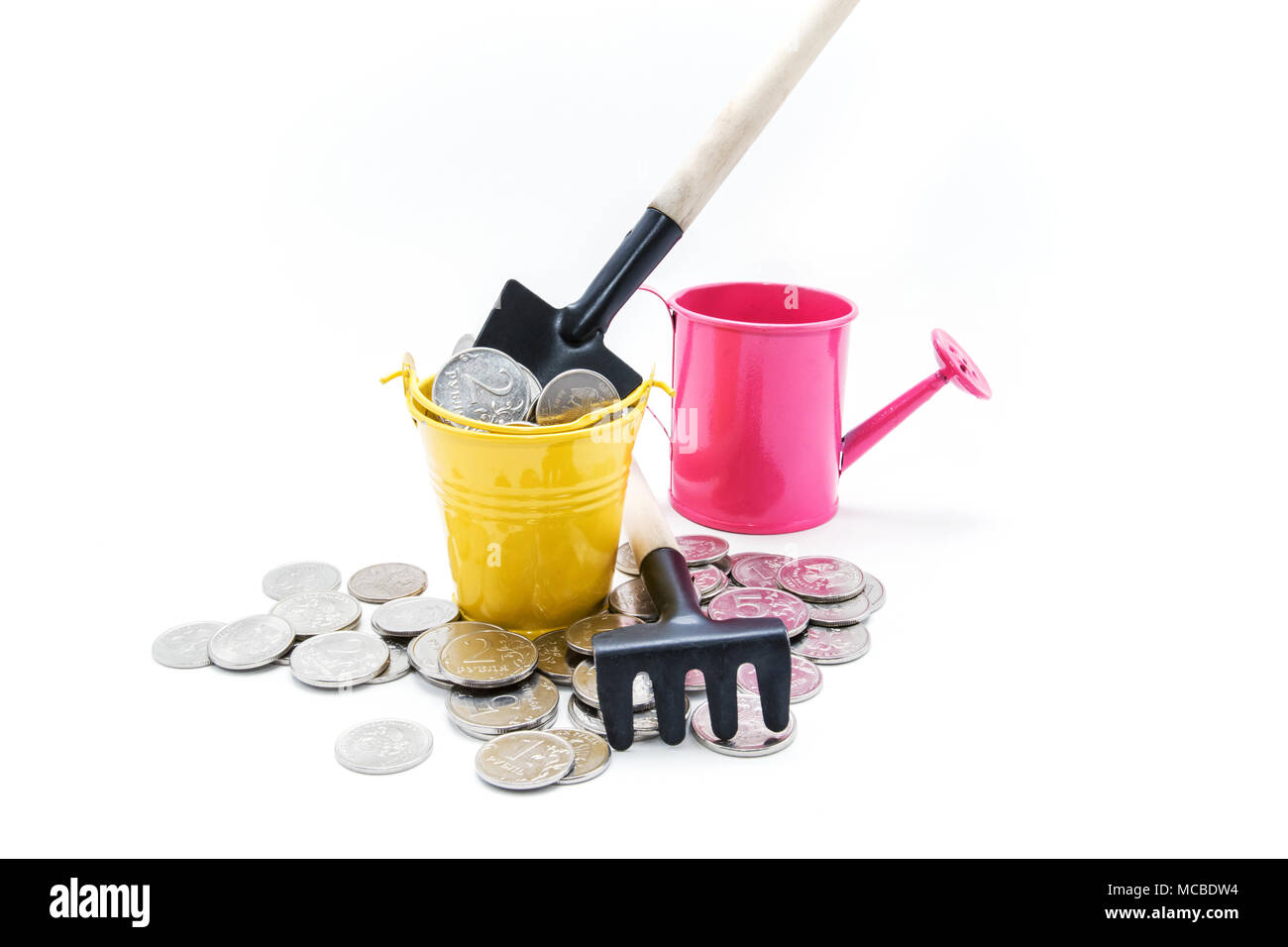 A full bucket of money and a shovel. The concept of monetary abundance ...