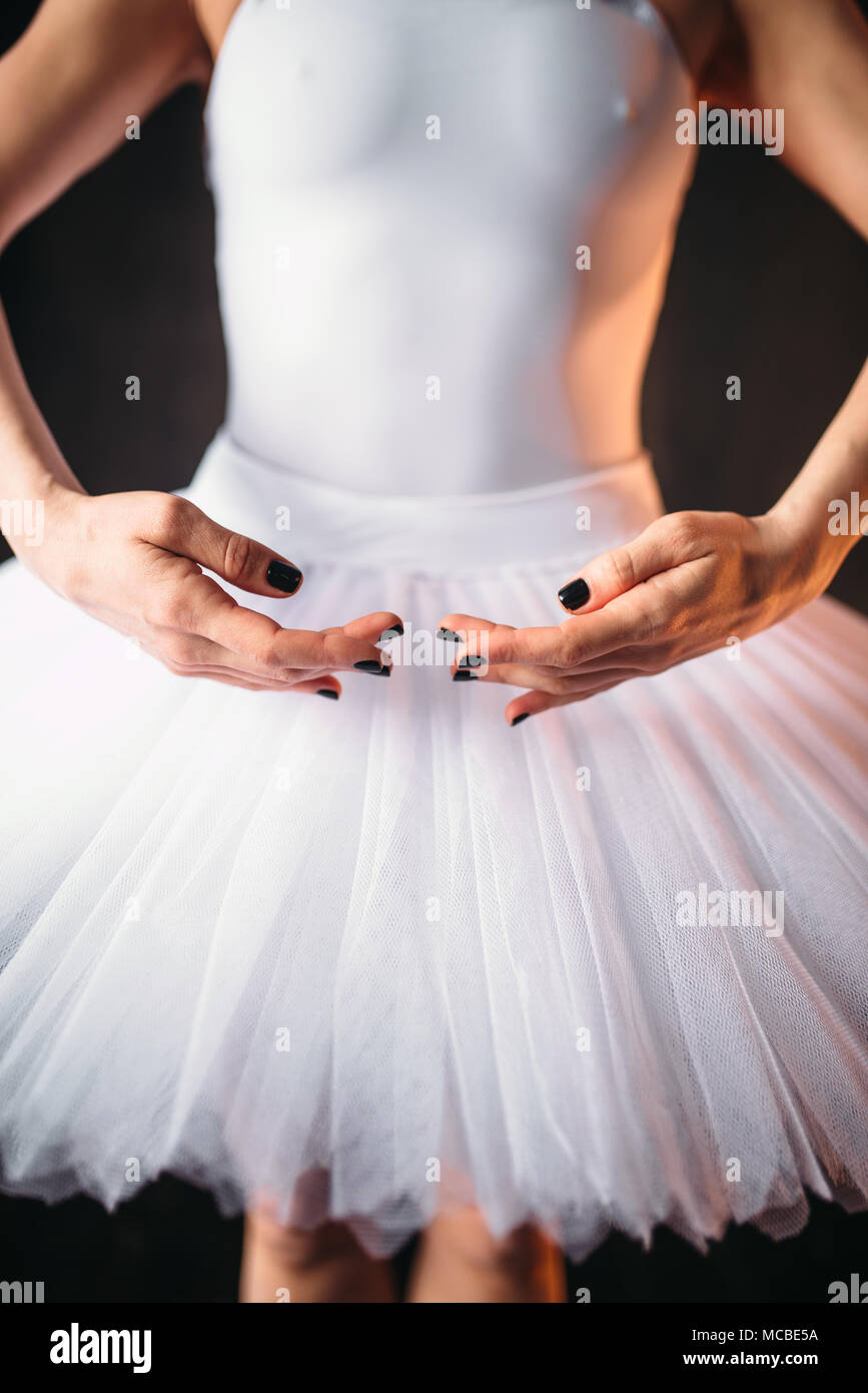 Classical ballet dancer body in white dress Stock Photo - Alamy