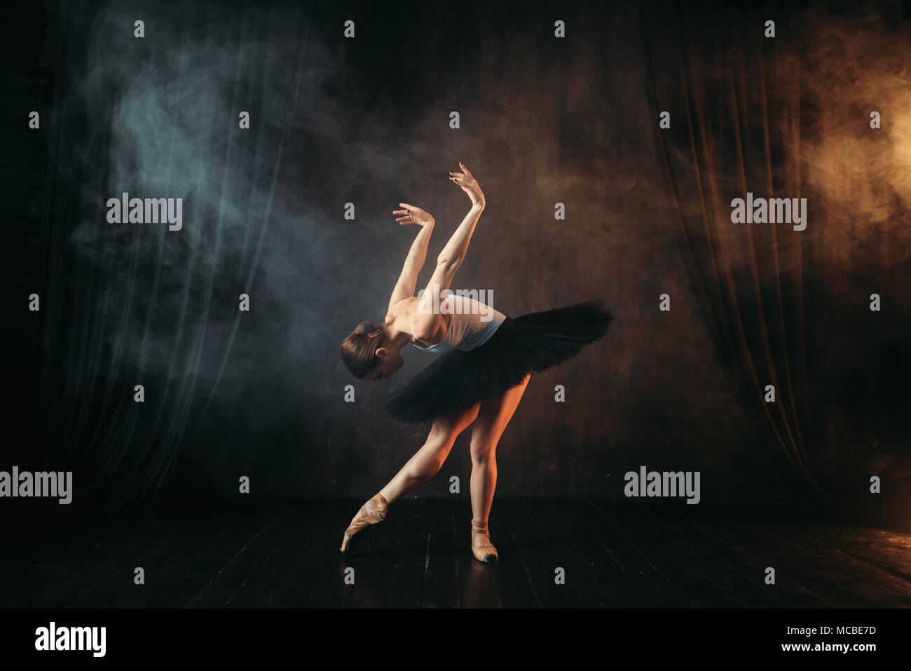 Elegance ballerina in action on theatrical stage Stock Photo - Alamy