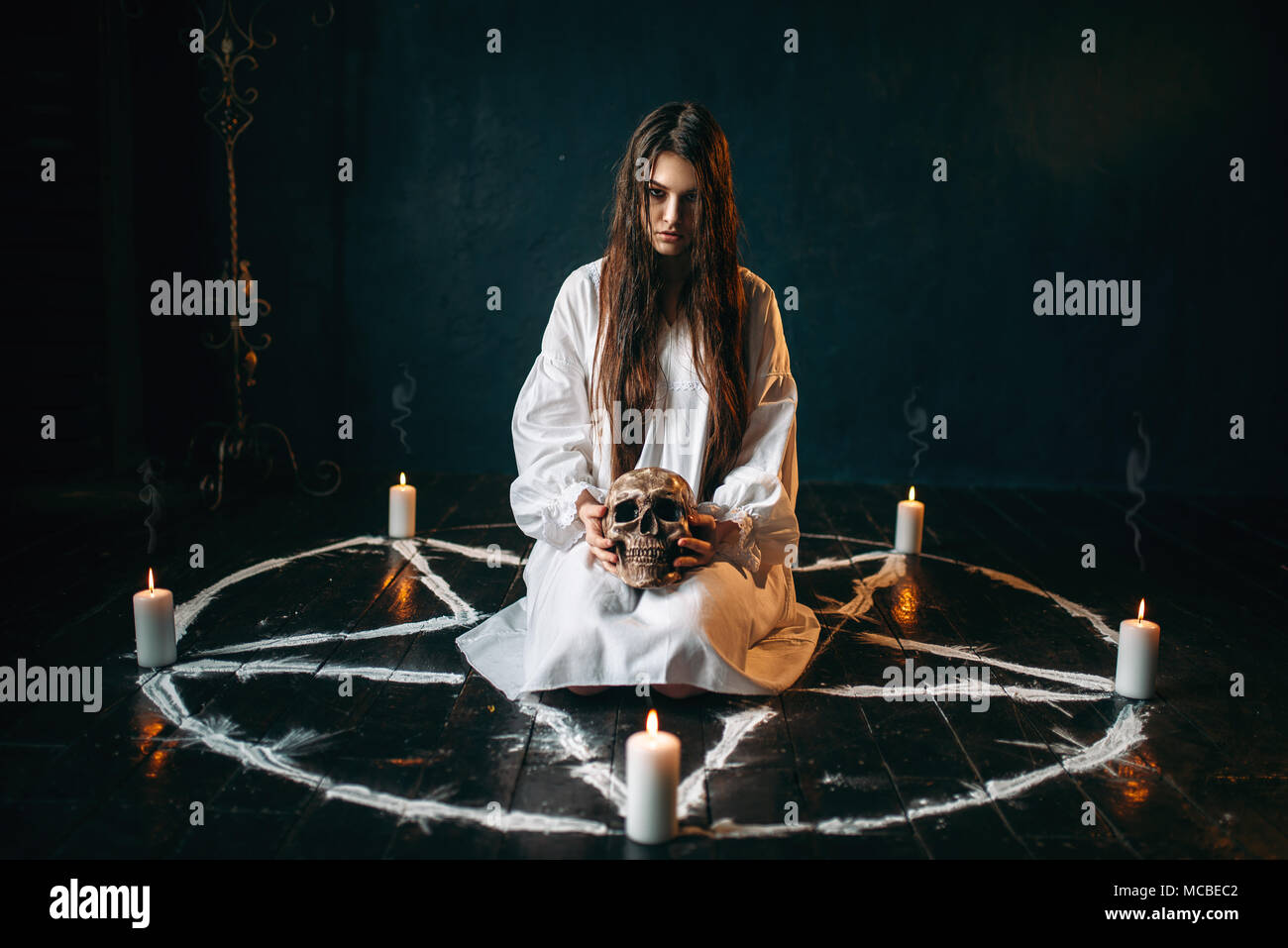 Woman holds ritual black magic hi-res stock photography and images - Alamy