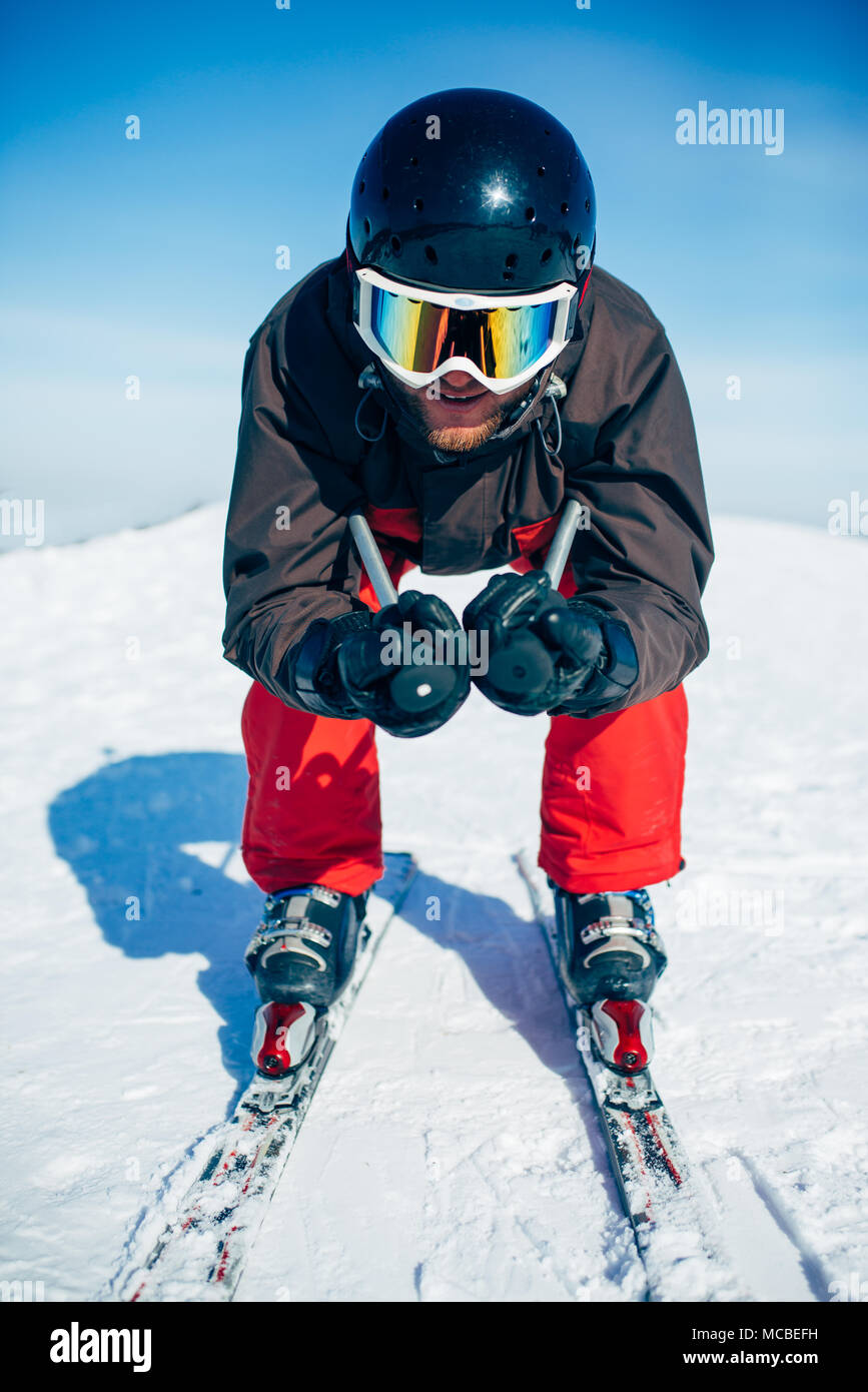 Skier racing from the mountain, front view Stock Photo - Alamy