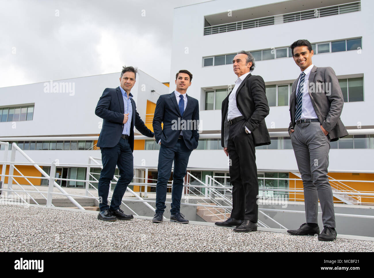 Group of Business man with suit in outdoor ambient Stock Photo - Alamy