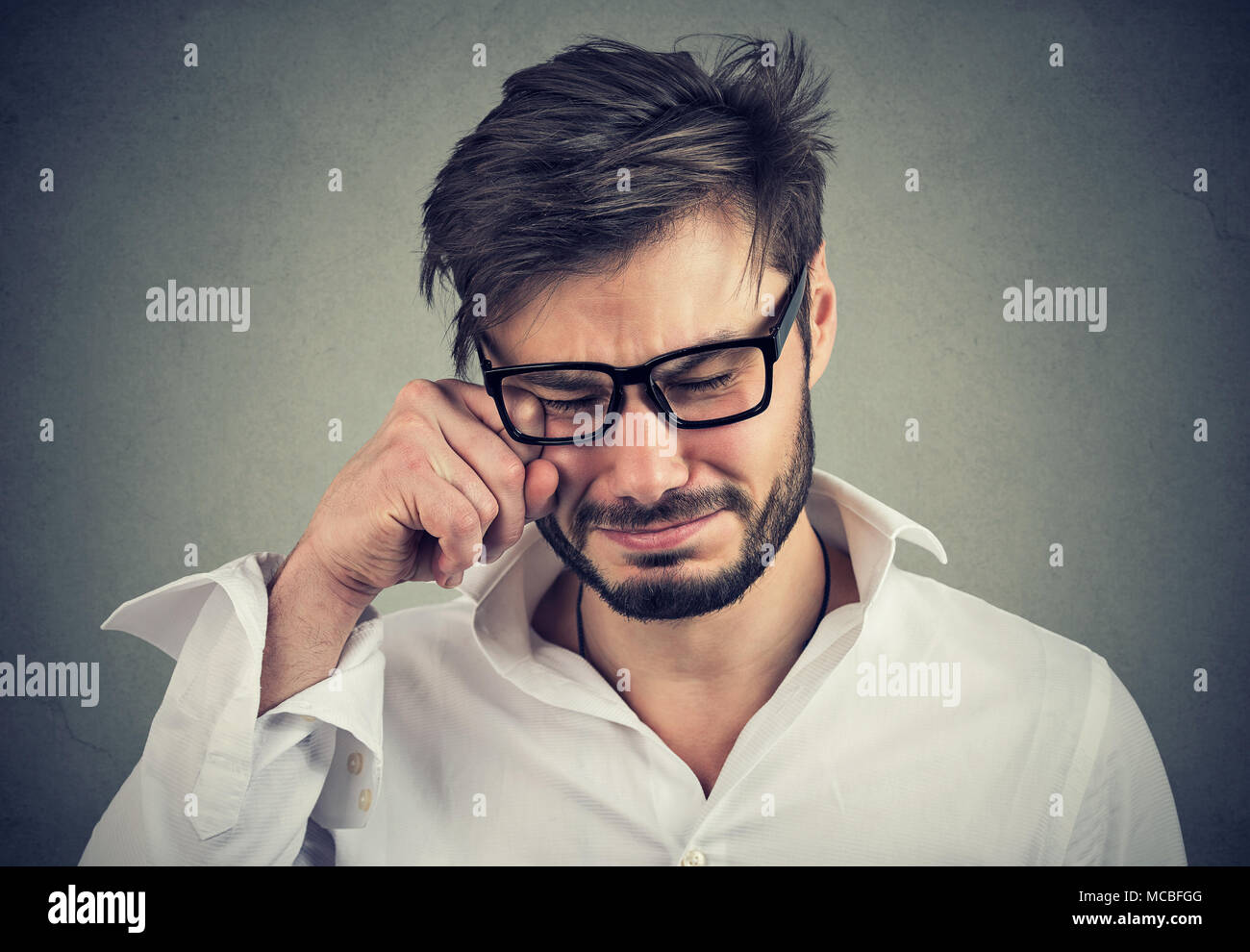 Closeup portrait of an crying adult man in glasses Stock Photo - Alamy