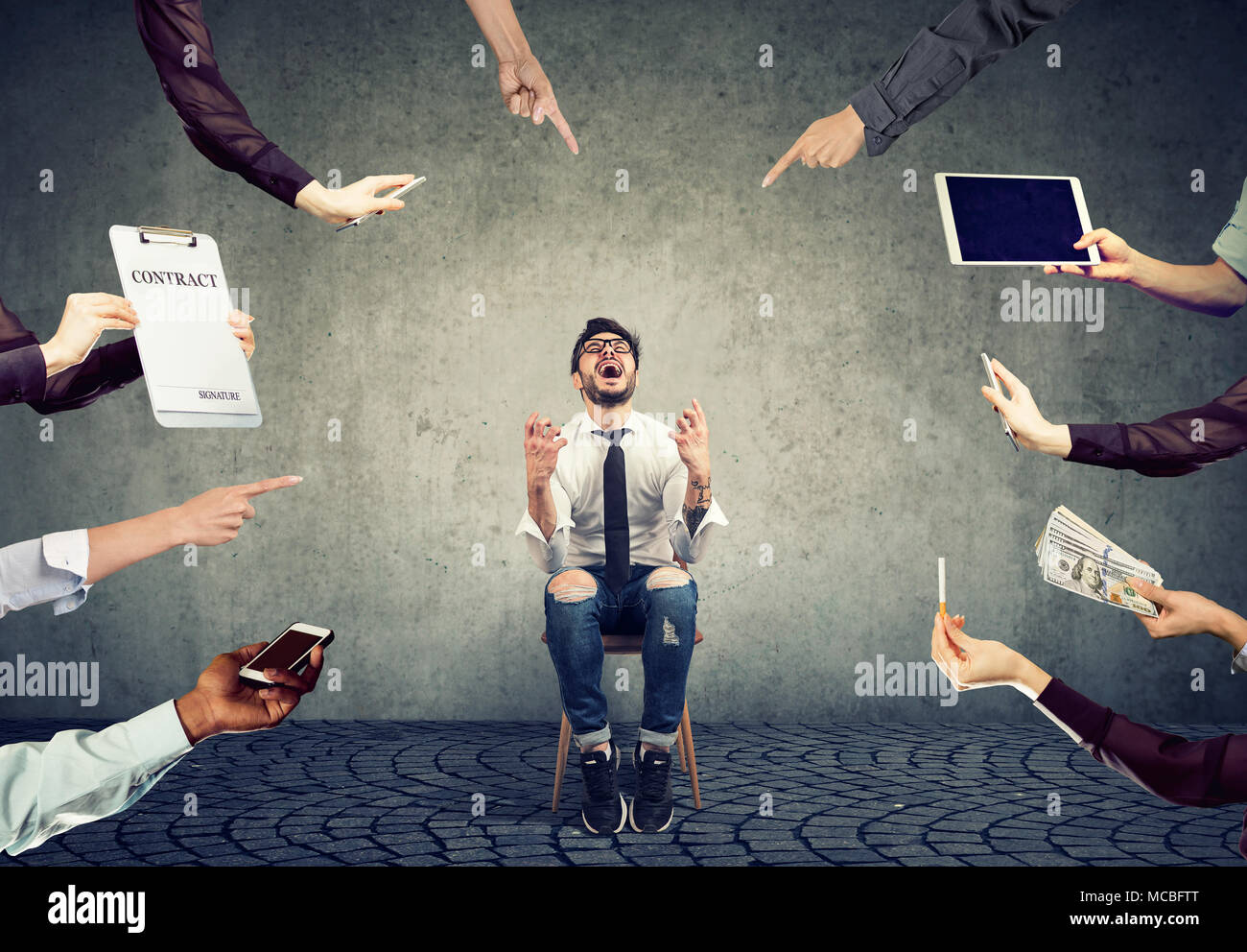 Young stressed business man tired of busy corporate life Stock Photo ...