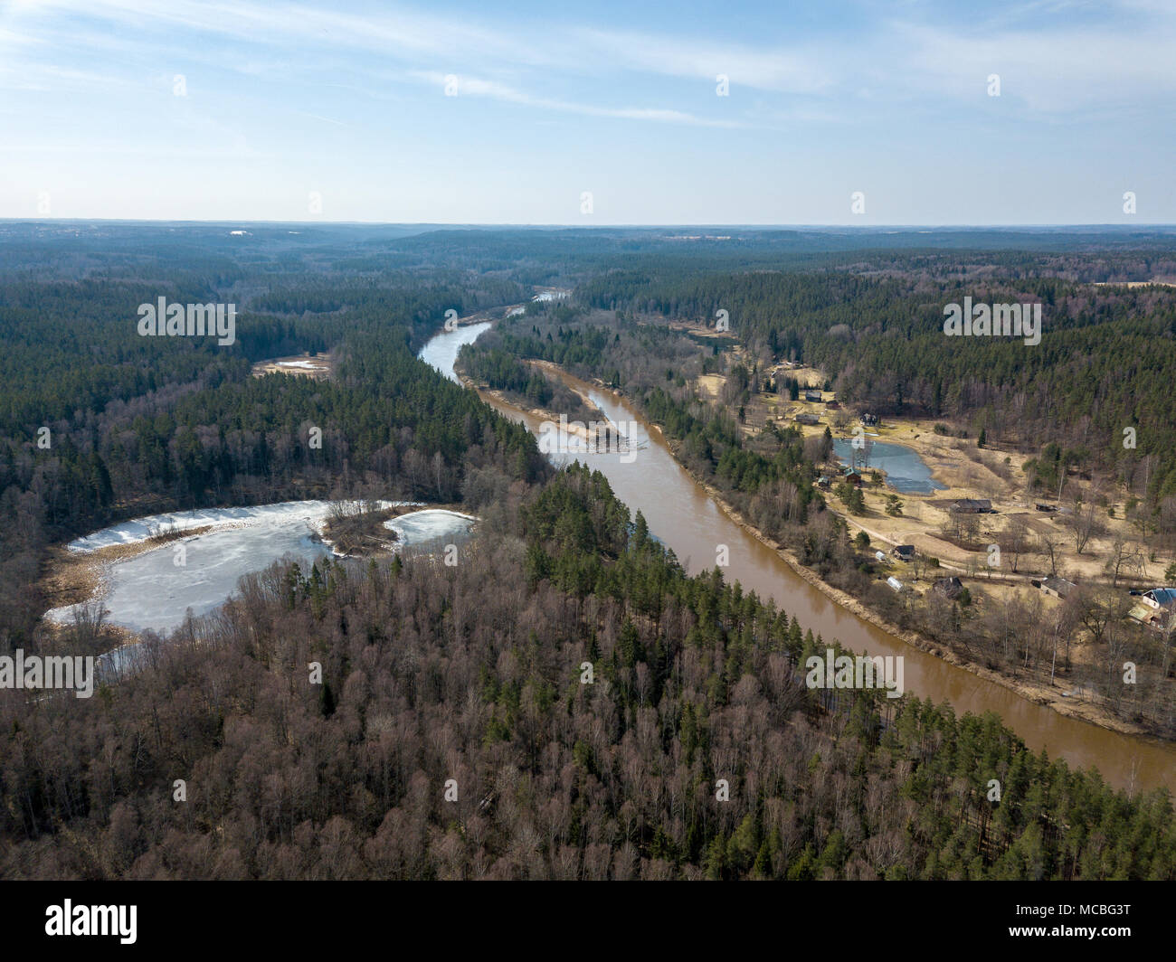 drone image. aerial view of forest river with sandstone cliffs in ...