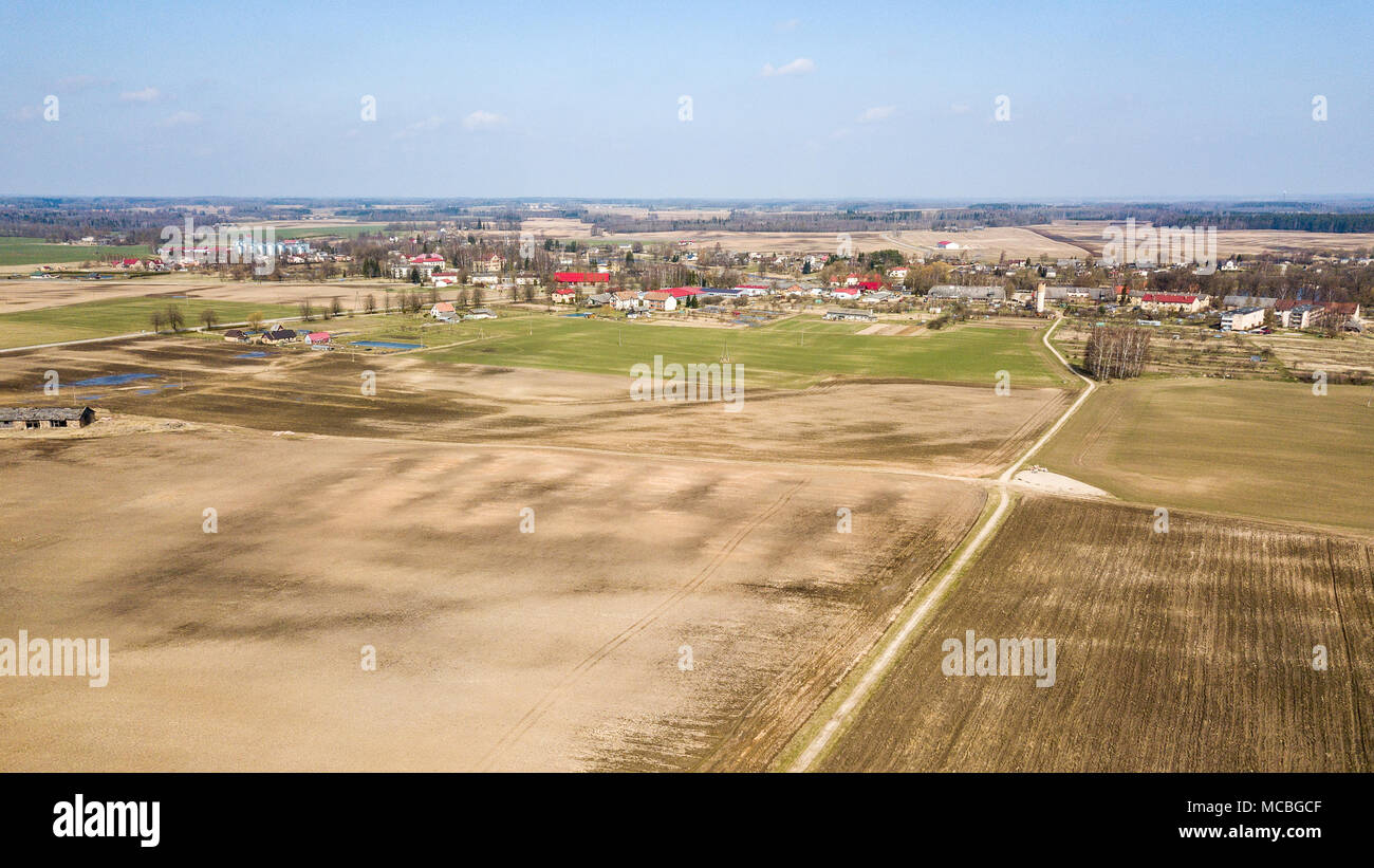 drone image. aerial view of wet cultivated agriculture fields near ...