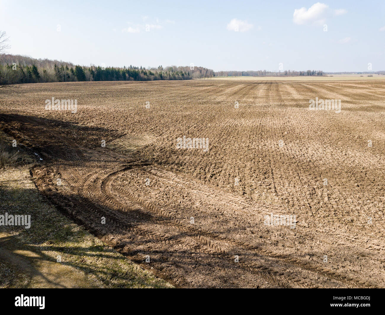 drone image. aerial view of wet cultivated agriculture fields near ...