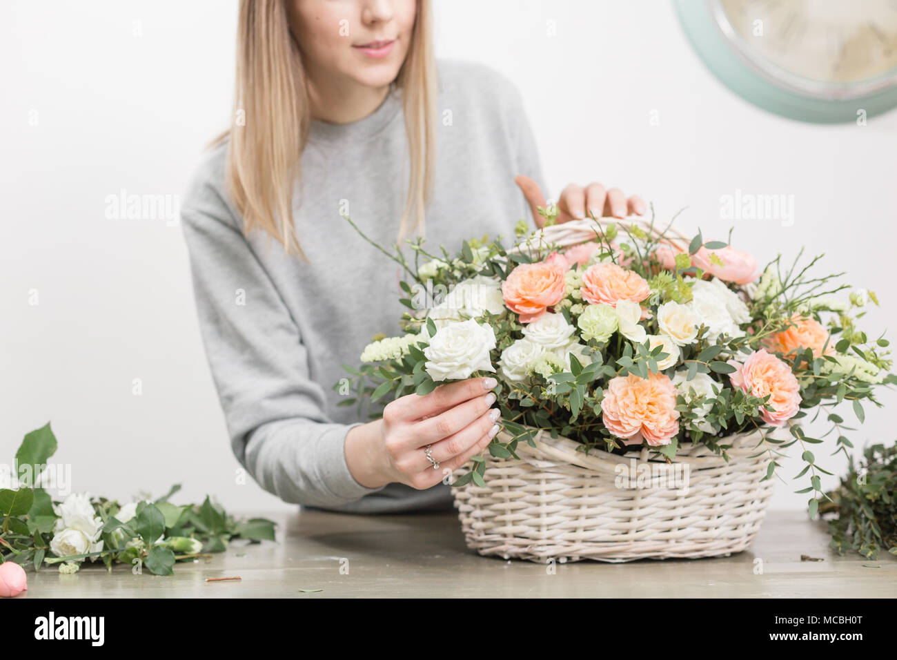 close-up hands female florist. Floral workshop - woman making a ...
