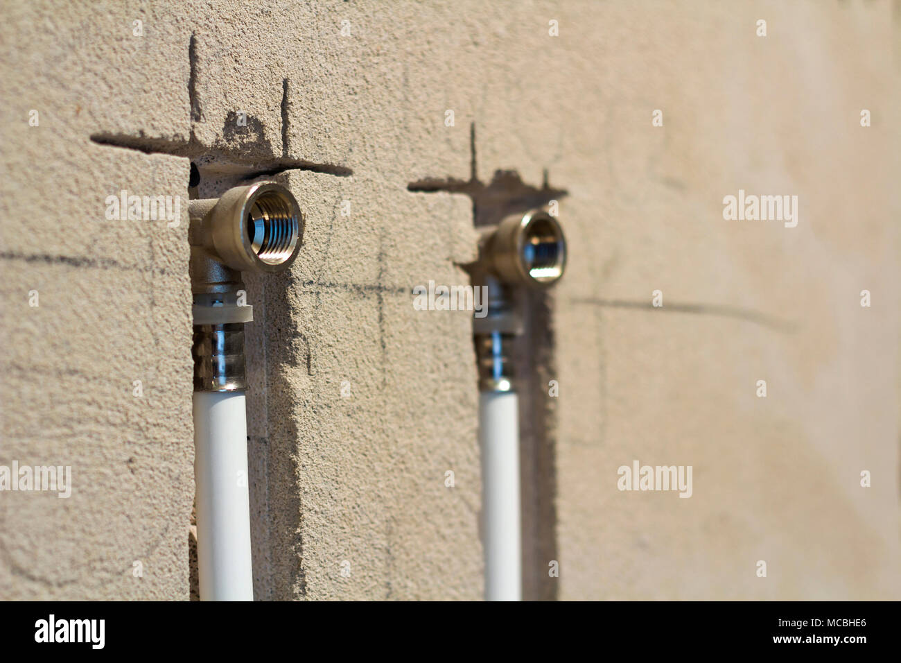 Water pipes made of polypropylene in the wall, plumbing in the house ...