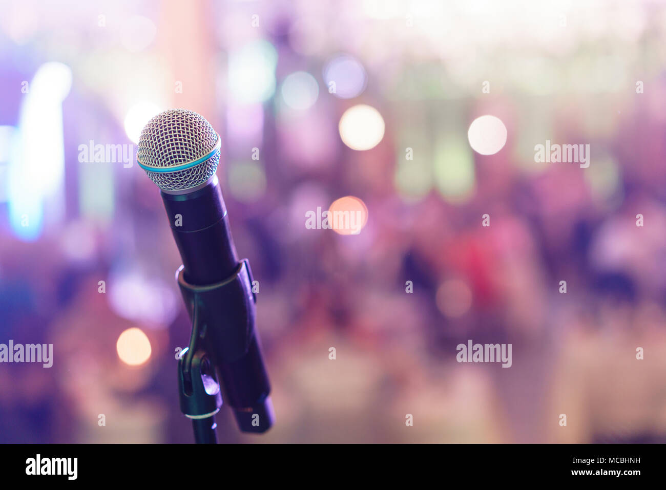 Close up microphone on stage in concert hall restaurant or conference ...