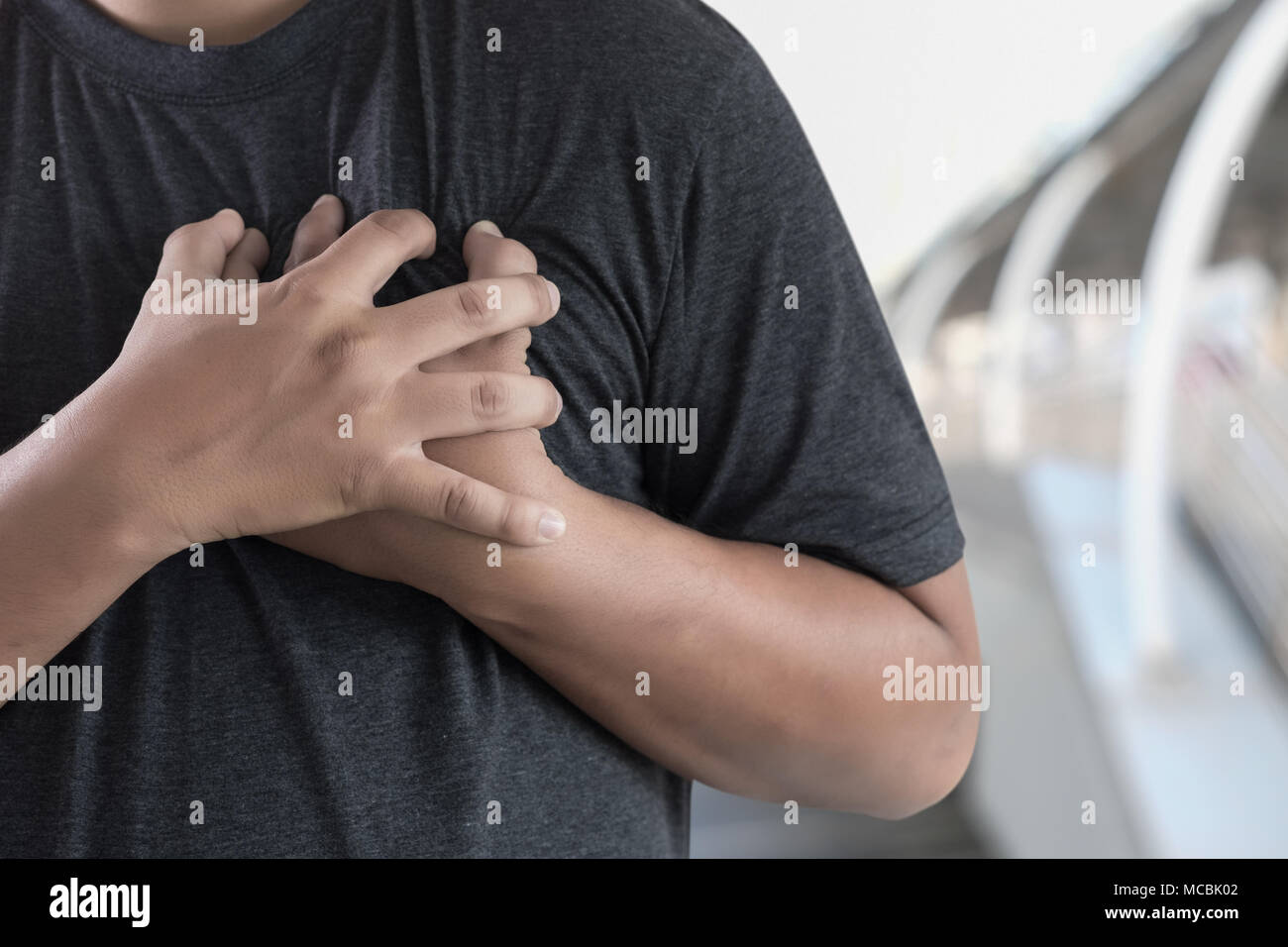 man disease chest pain suffering Heart attack Stock Photo - Alamy