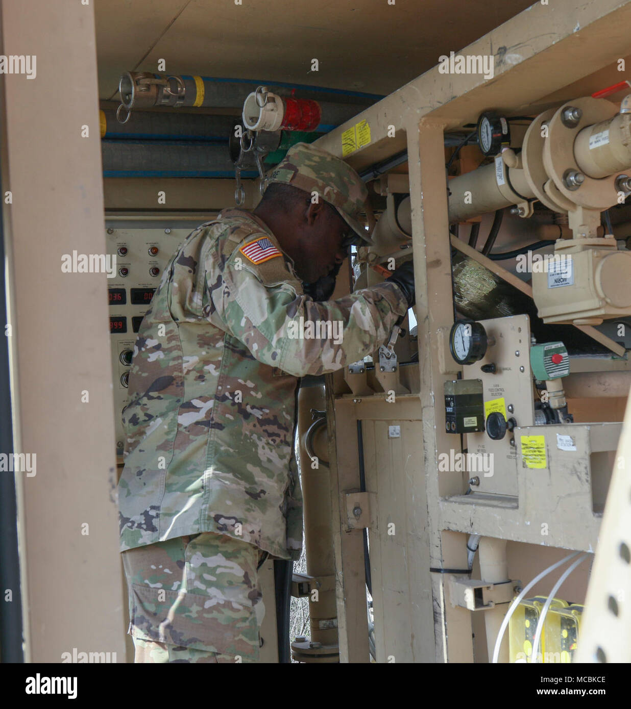 A soldier from 289th Quartermaster Company (289th QM Co.), 553D Combat ...