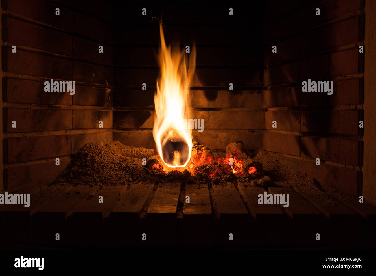 Log burning in Fireplace Stock Photo - Alamy