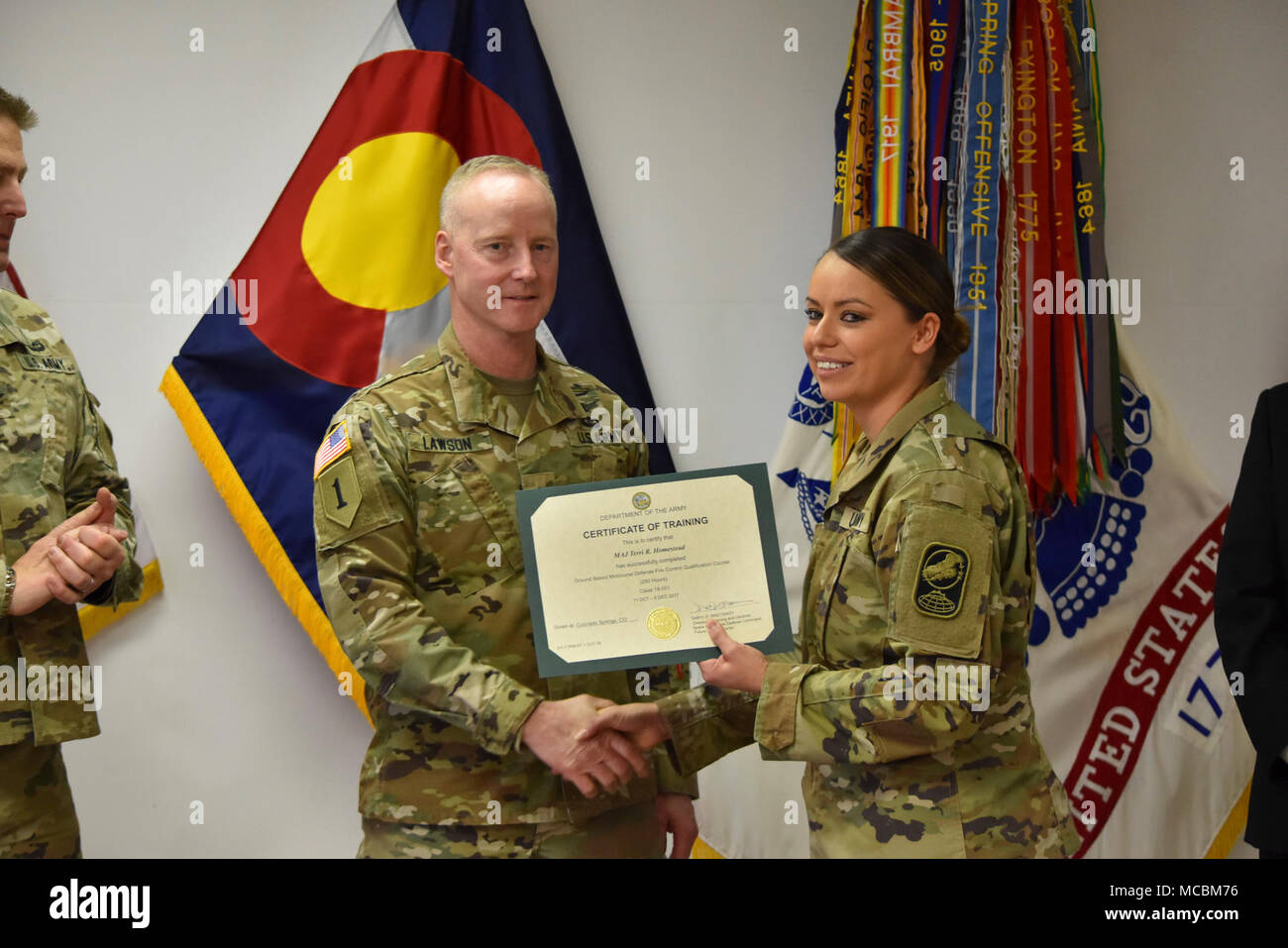 Army Maj. Terri Rae Lopez-Homestead stands with Brig. Gen. Timothy ...