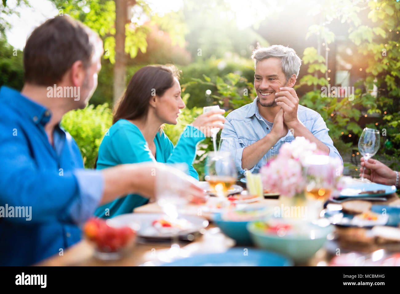 Group people in 30s at dinner table hi-res stock photography and images ...