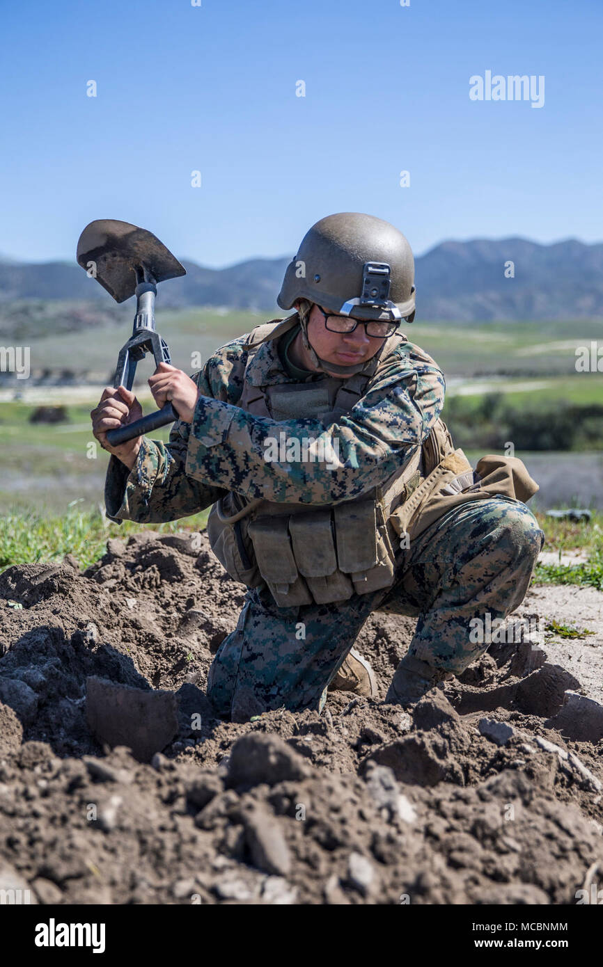 U.S. Marine Corps Pfc. David Flores, a student with Golf Company ...