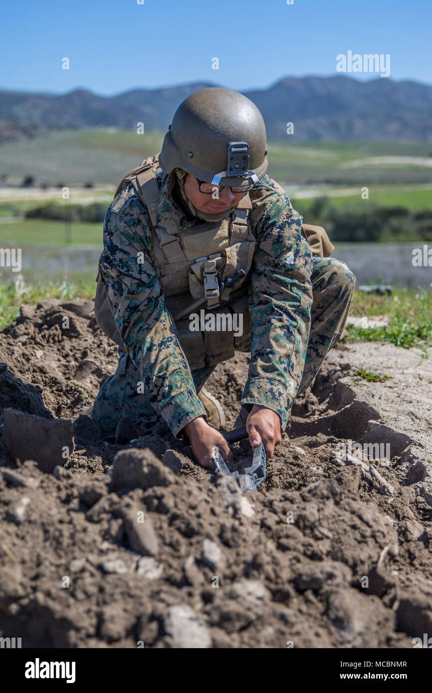 U.S. Marine Corps Pfc. David Flores, a student with Golf Company ...