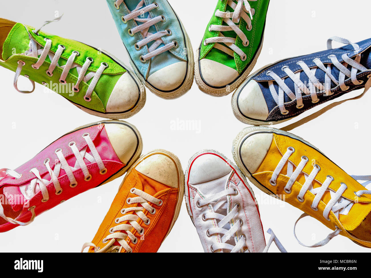 Colorful shoes on white background. Cool youth colorful white yellow ...
