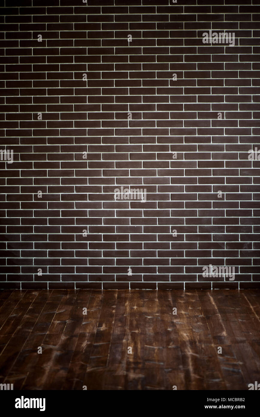 background of a brick dark wall, tile texture with a smooth pattern ...