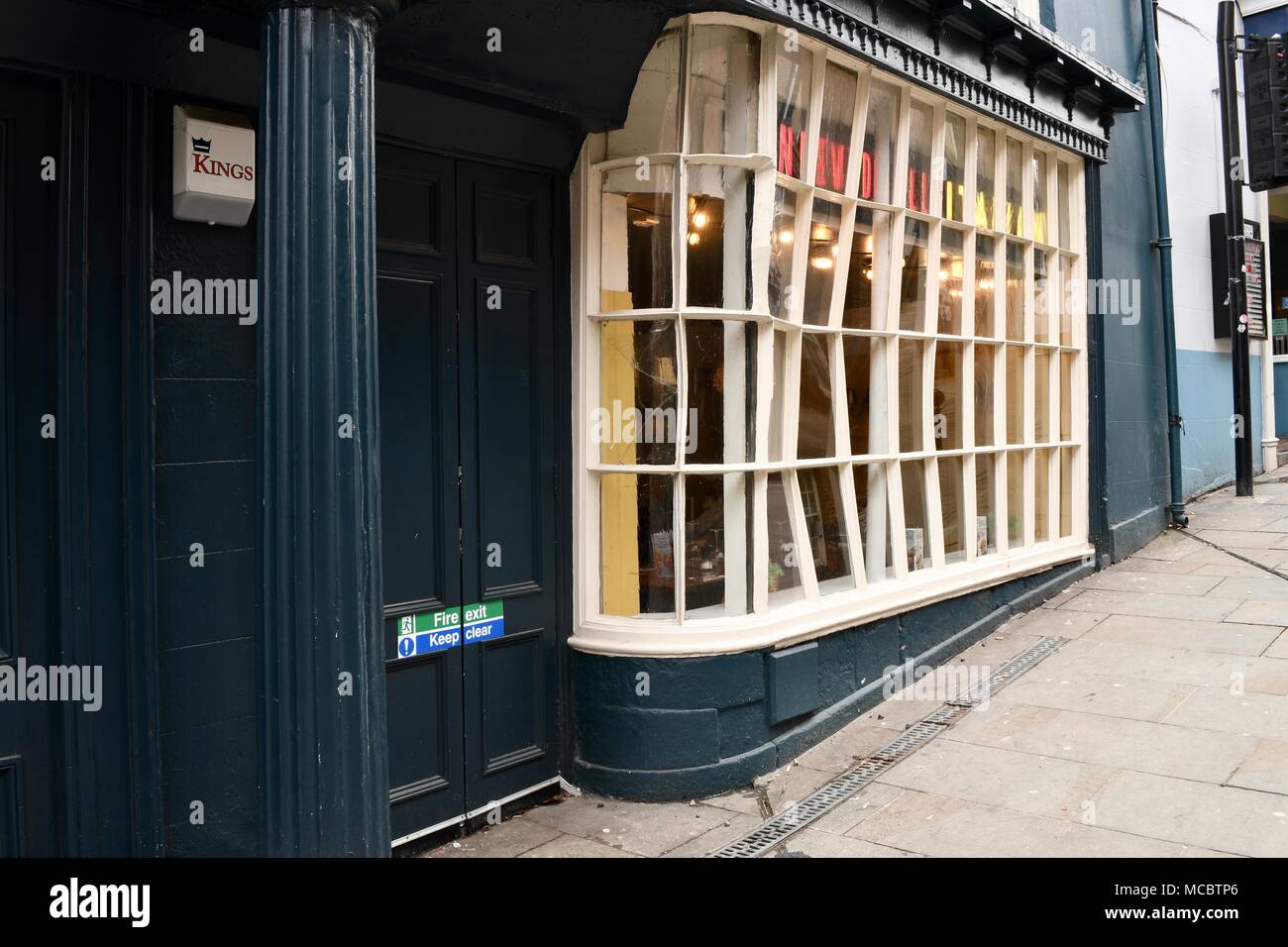 Shop front with bent window on Saddler Street in Durham Stock Photo - Alamy