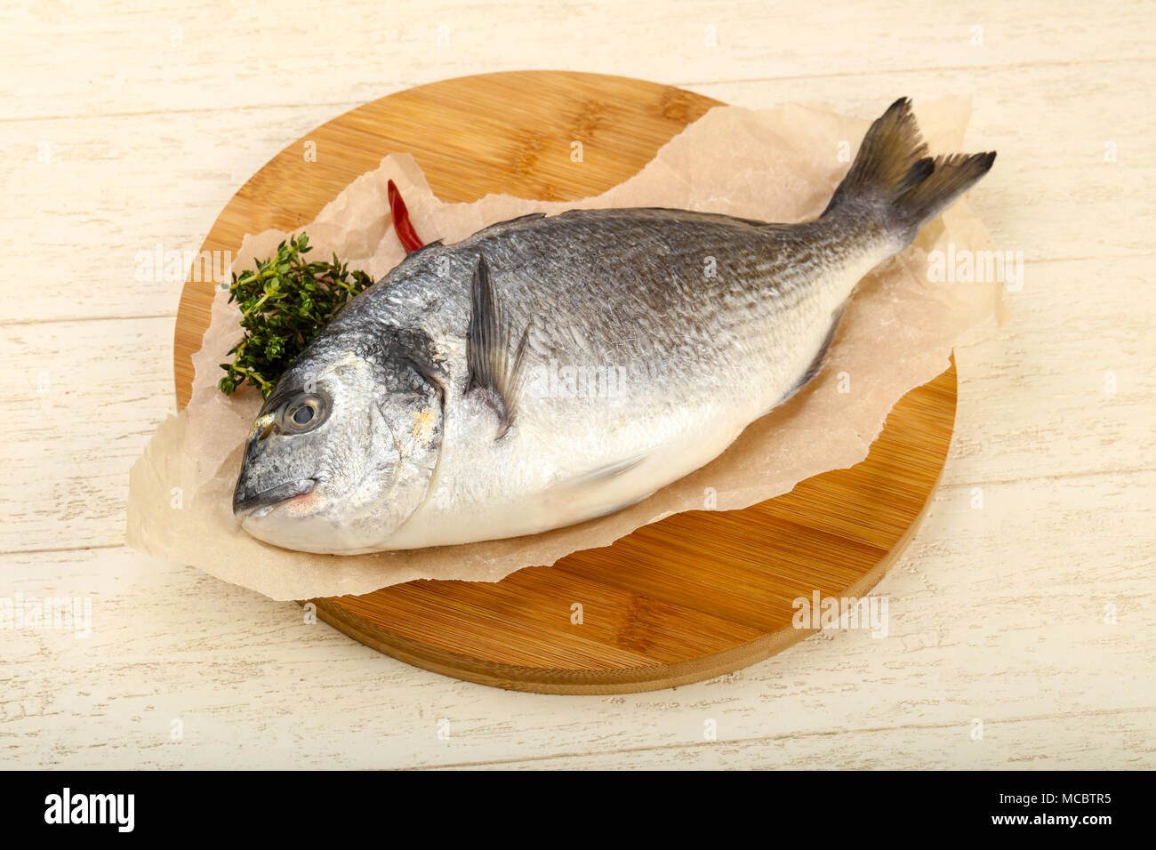 raw dorada fish - ready for cooking Stock Photo - Alamy