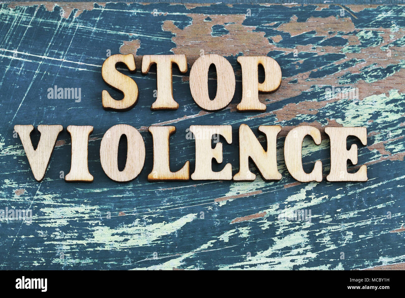 Stop violence written with wooden letters on rustic surface Stock Photo ...
