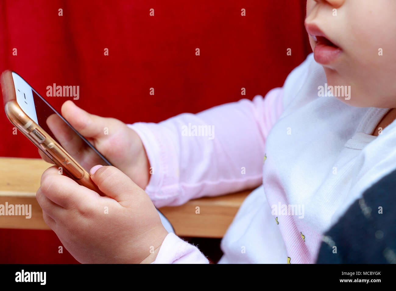 Child girl portrait touch face closeup hi-res stock photography and ...