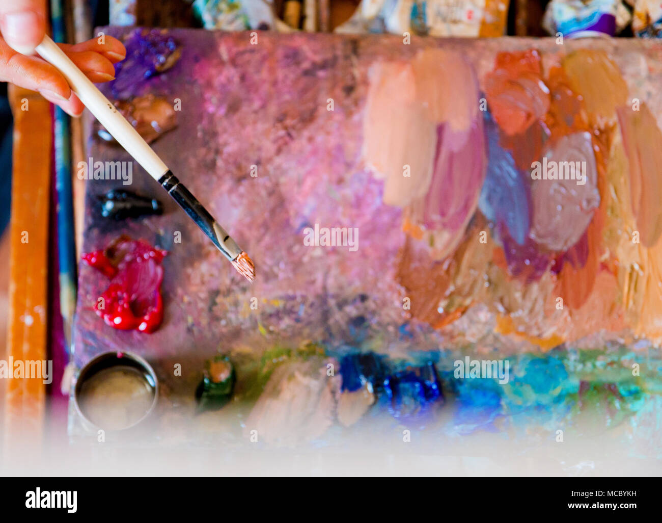 Brush artist and palette Artist's workshop Stock Photo - Alamy