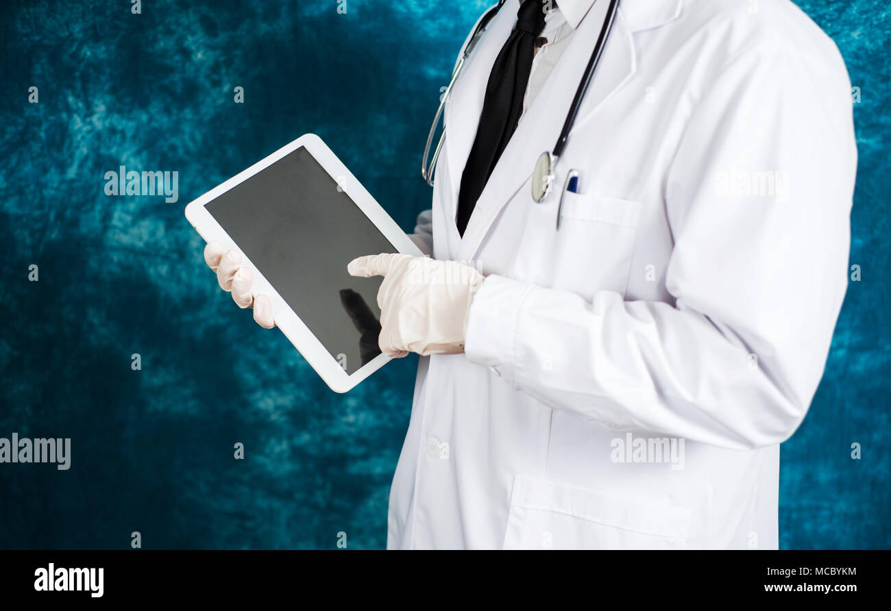Close up doctor using tablet hi-res stock photography and images - Alamy