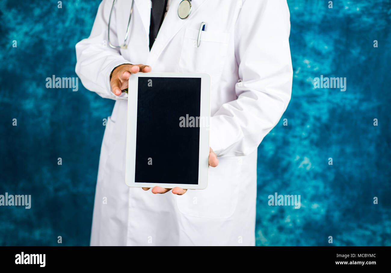 Doctor with touch tablet hi-res stock photography and images - Alamy